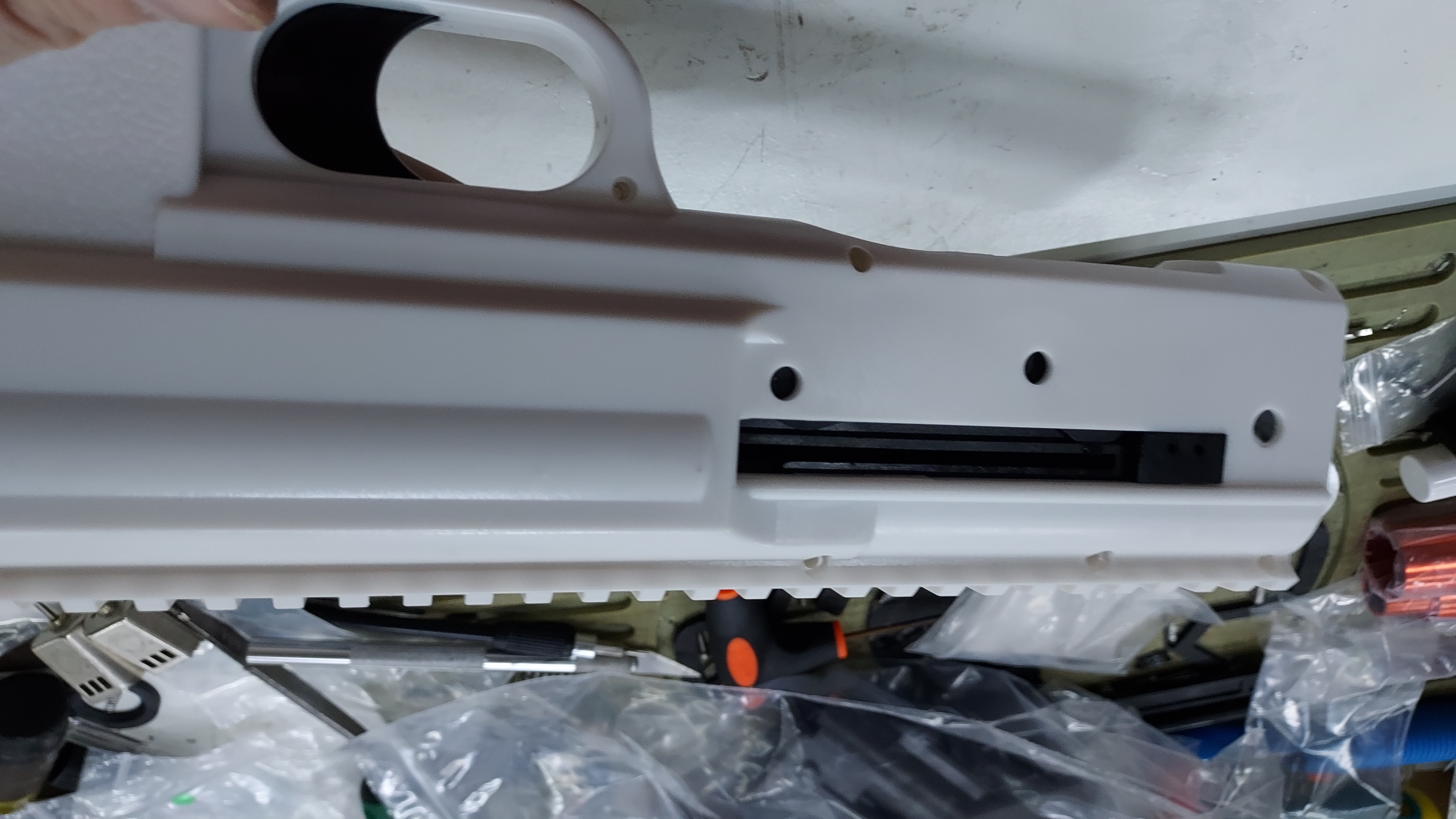 other holder point of the Shell Lifter (If it is ajar, use a flat head ...