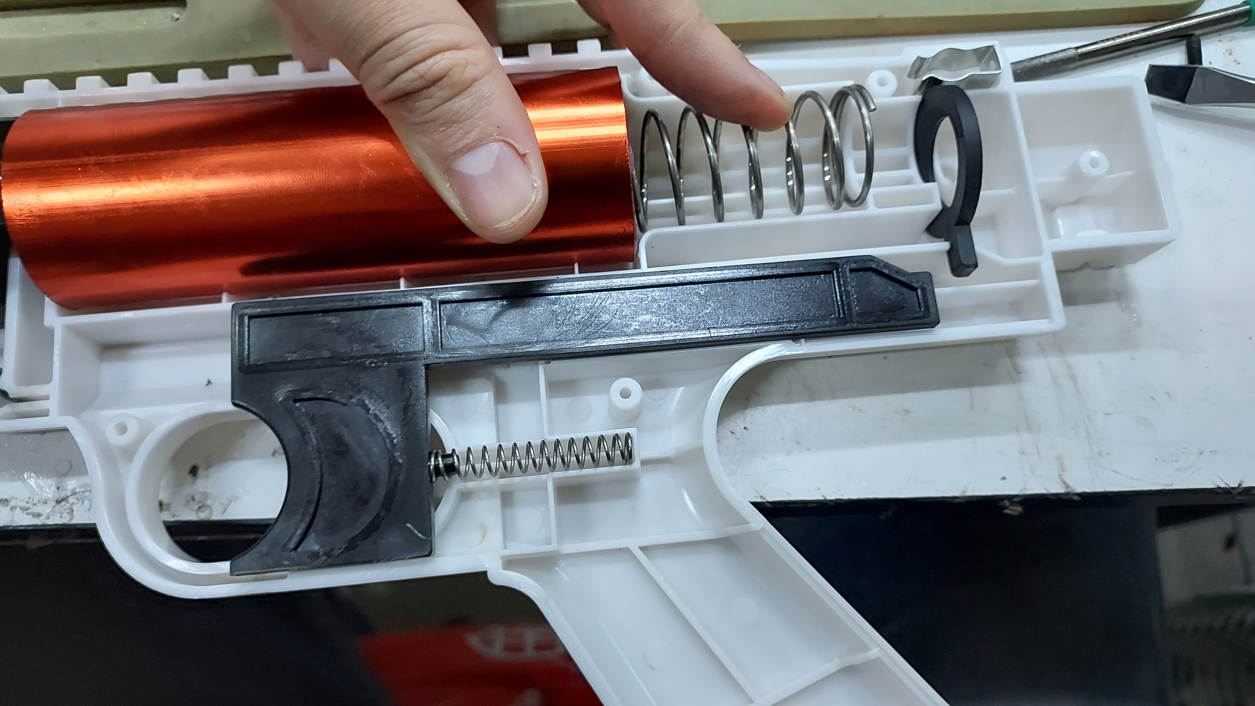 (The trimmed trigger now placed in position.)