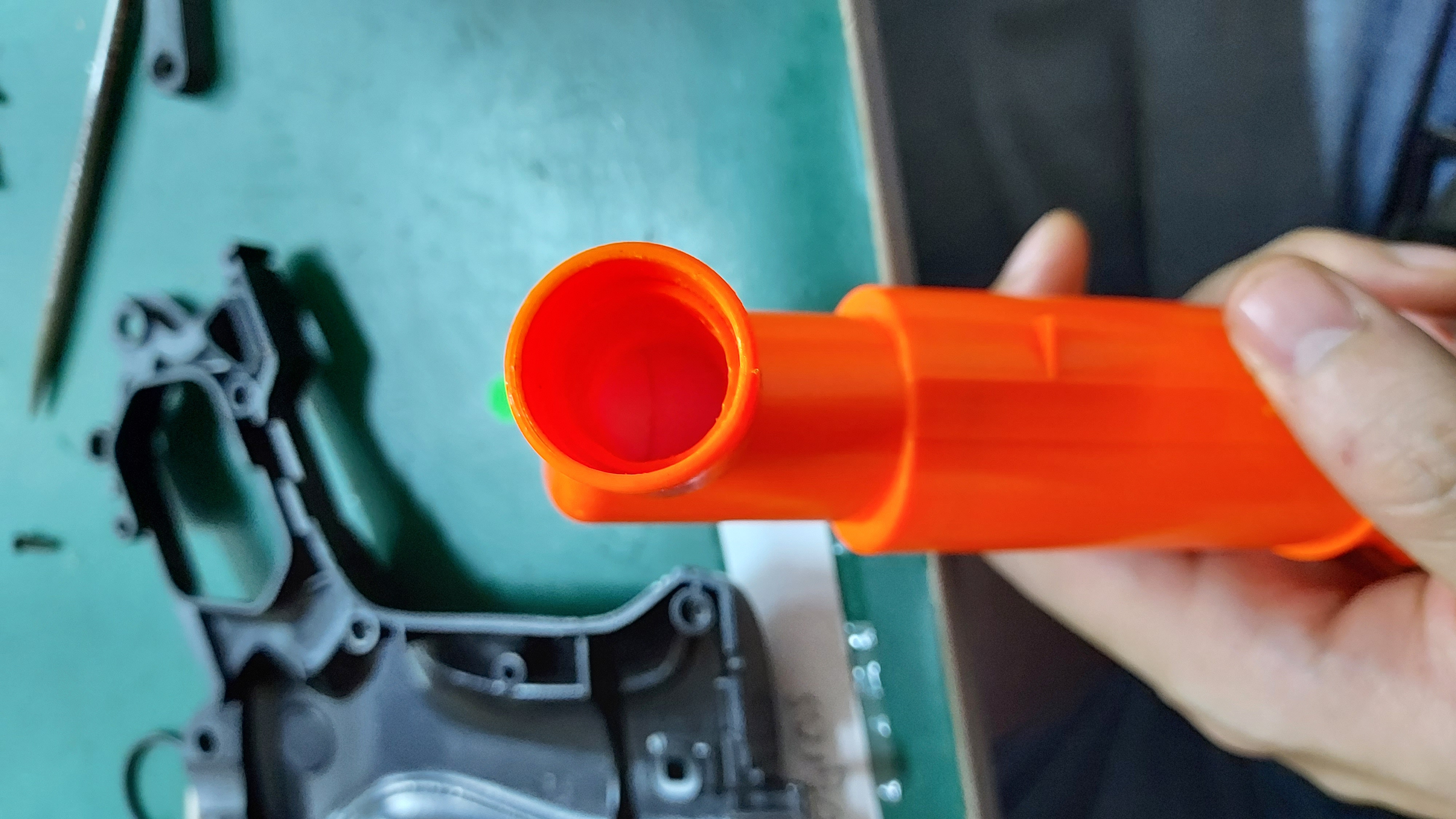 Drill a hole at the bottom of the grip for the tube to sit through, as ...