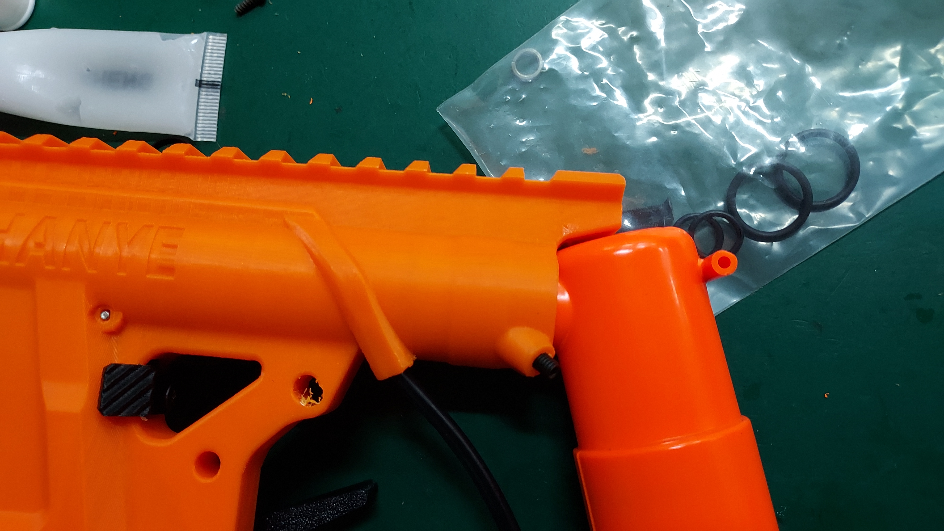 After placing it in, tighten 3 grub screws at the receiver shell to ...